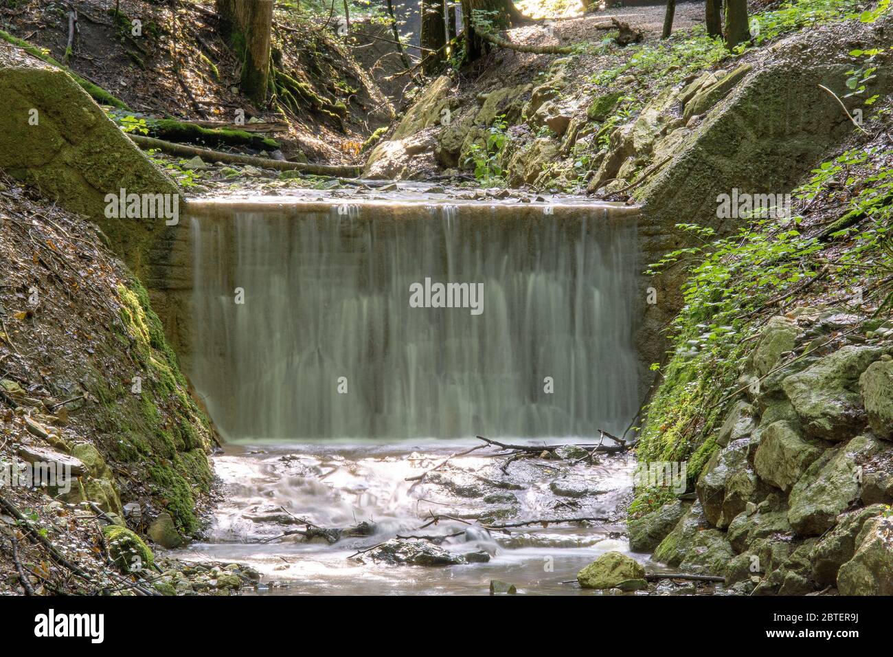 Bach im Wald mit Verbauung in Ainring Richtung Ulrichshögl Stock Photo ...