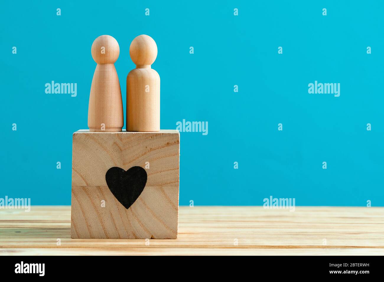 Small wooden figures of family members. Family relationship symbol ...