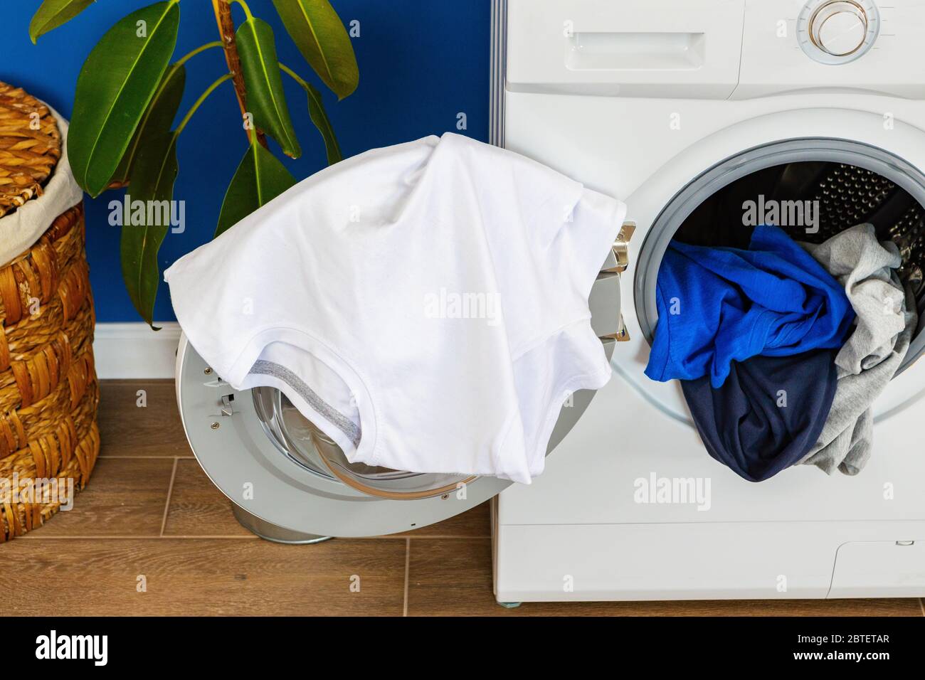 Laundry room. Close up of washing machine Stock Photo - Alamy