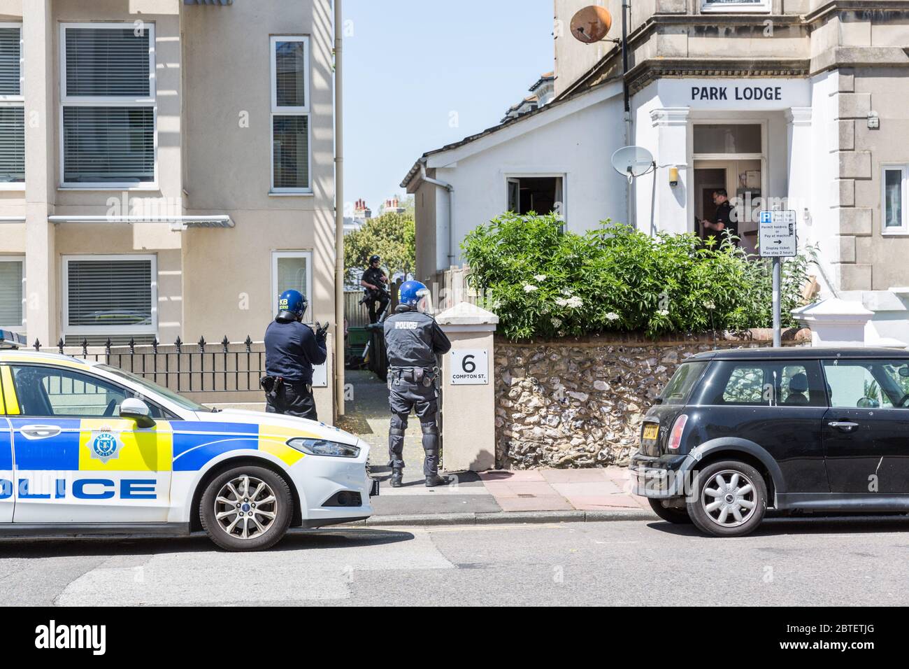 Eastbourne, England. 25 May 2020. Armed police in Compton Street ...