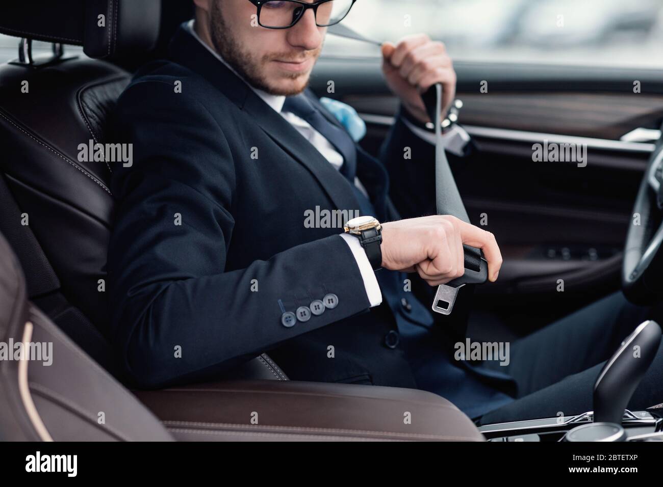 Putting seatbelt hi-res stock photography and images - Alamy