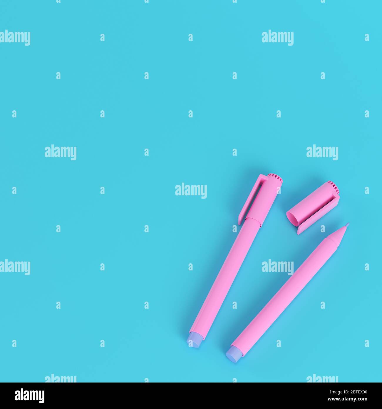 Pink marker pens on bright blue background in pastel colors. Minimalism ...