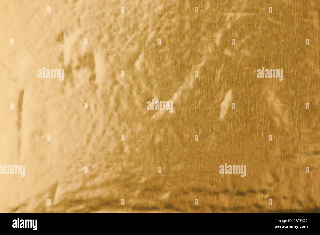 Gold reflective metal texture background macro close up view Stock ...