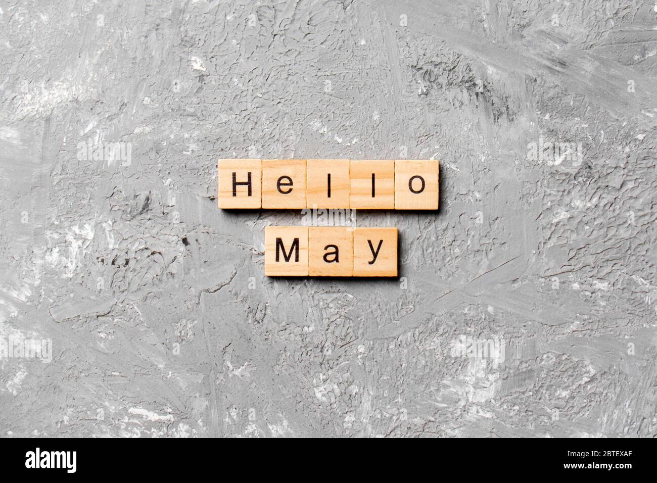 hello May word written on wood block. hello May text on table, concept ...