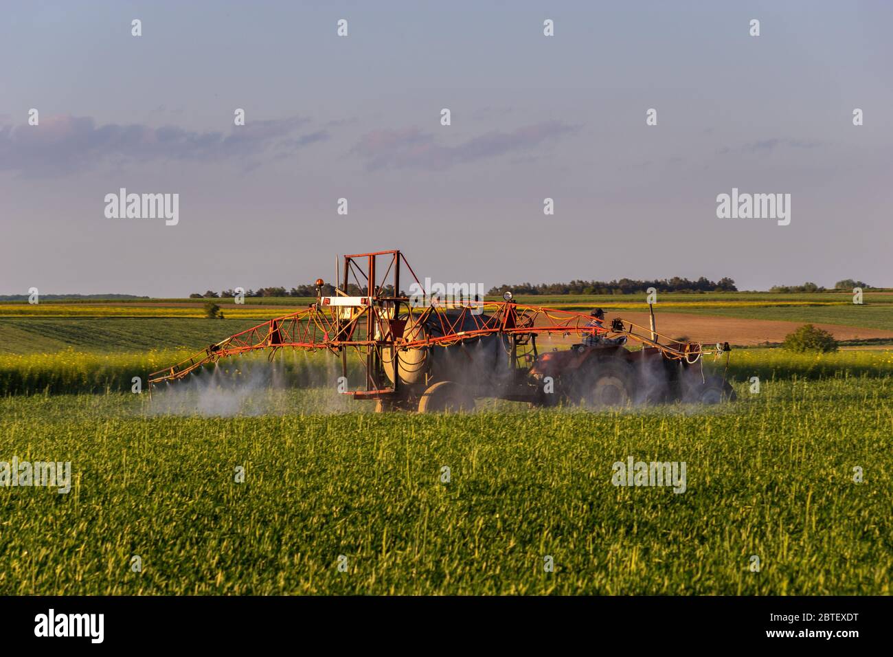 old farm tractor with sprayer during field work Stock Photo - Alamy