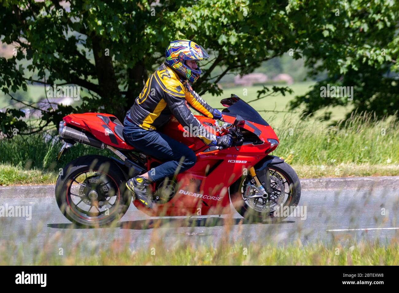 2008 red Ducati 1098 S; Motorbike rider; two wheeled transport, motorcycles, vehicle, roads ...