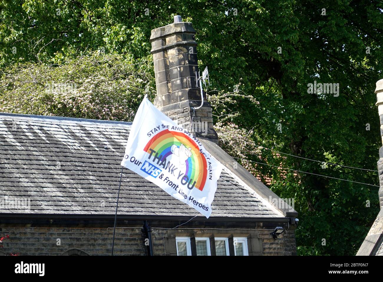 New Mills, Derbyshire. May 25th. 2020 A flag supporting the NHS, and ...