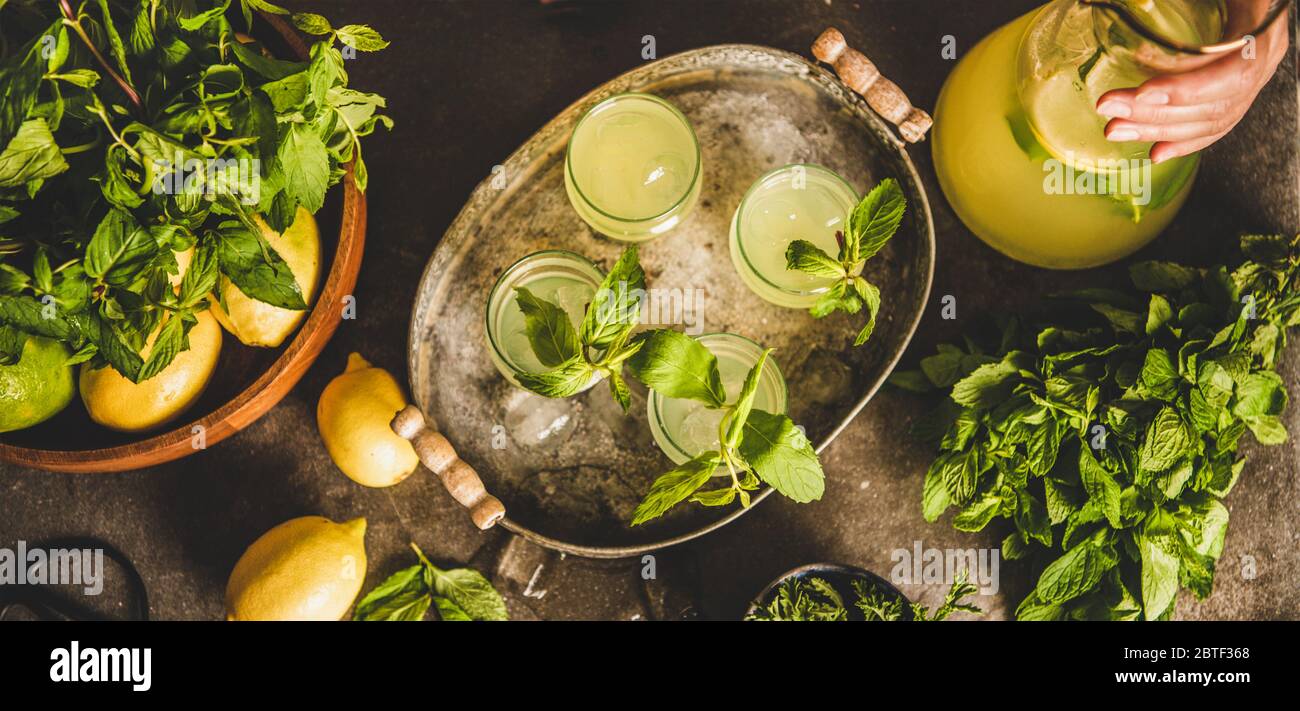 Fresh homemade citrus lemonade in tray over grey kitchen counter Stock ...