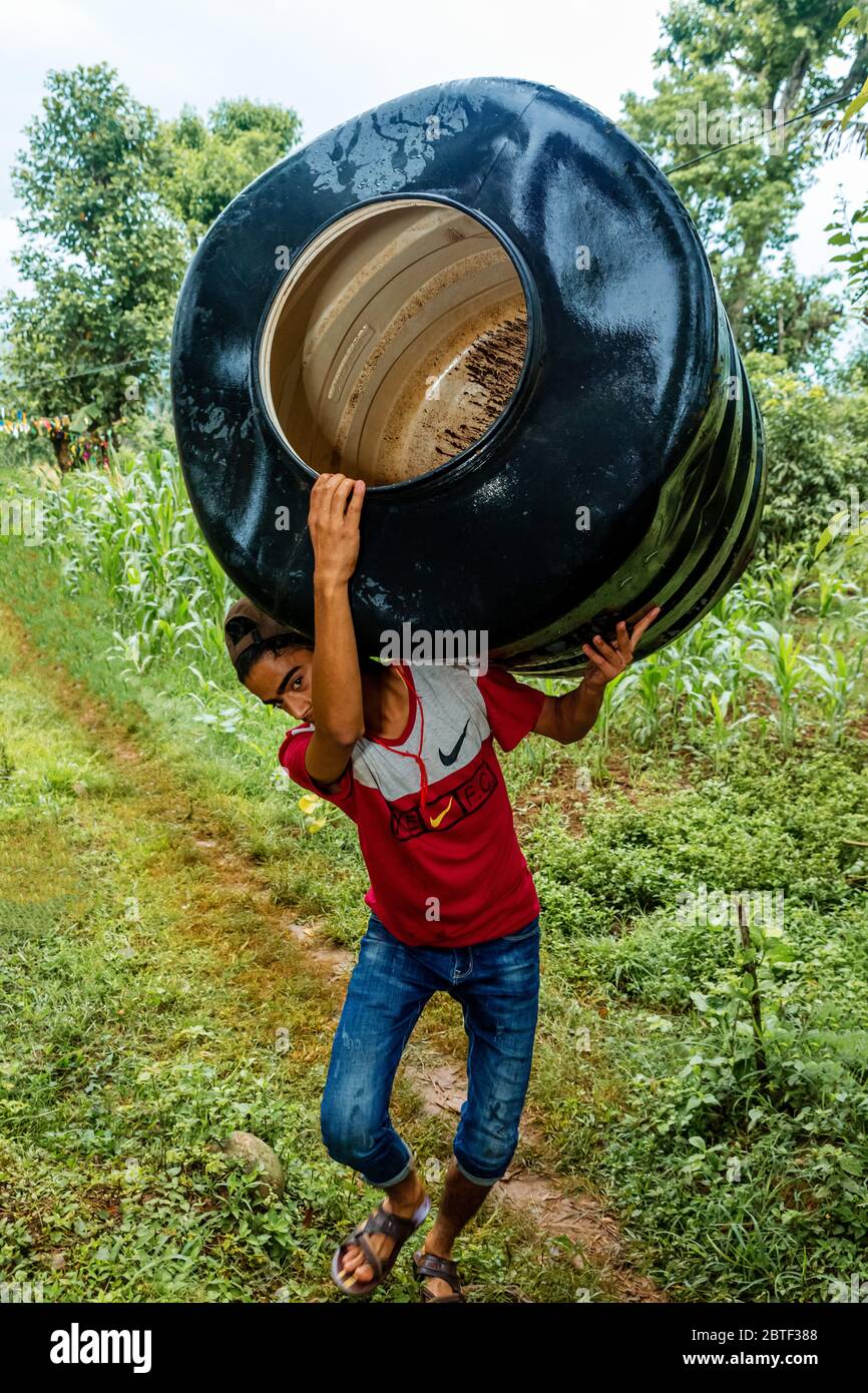 Man Carrying Heavy Load High Resolution Stock Photography and Images ...