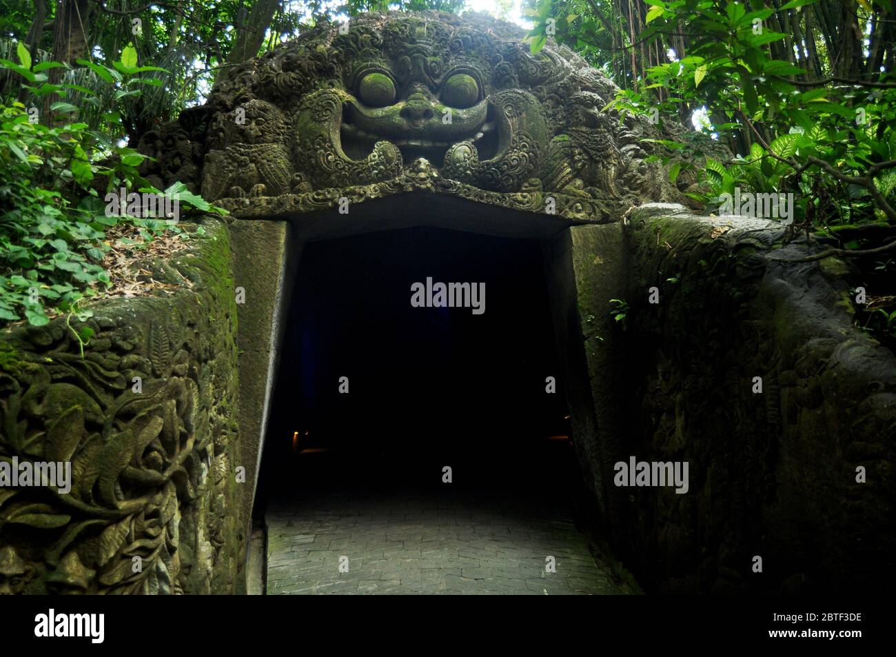 Ancient tunnel or ruins cave of Mandala Suci Wenara Wana or Ubud Sacred ...