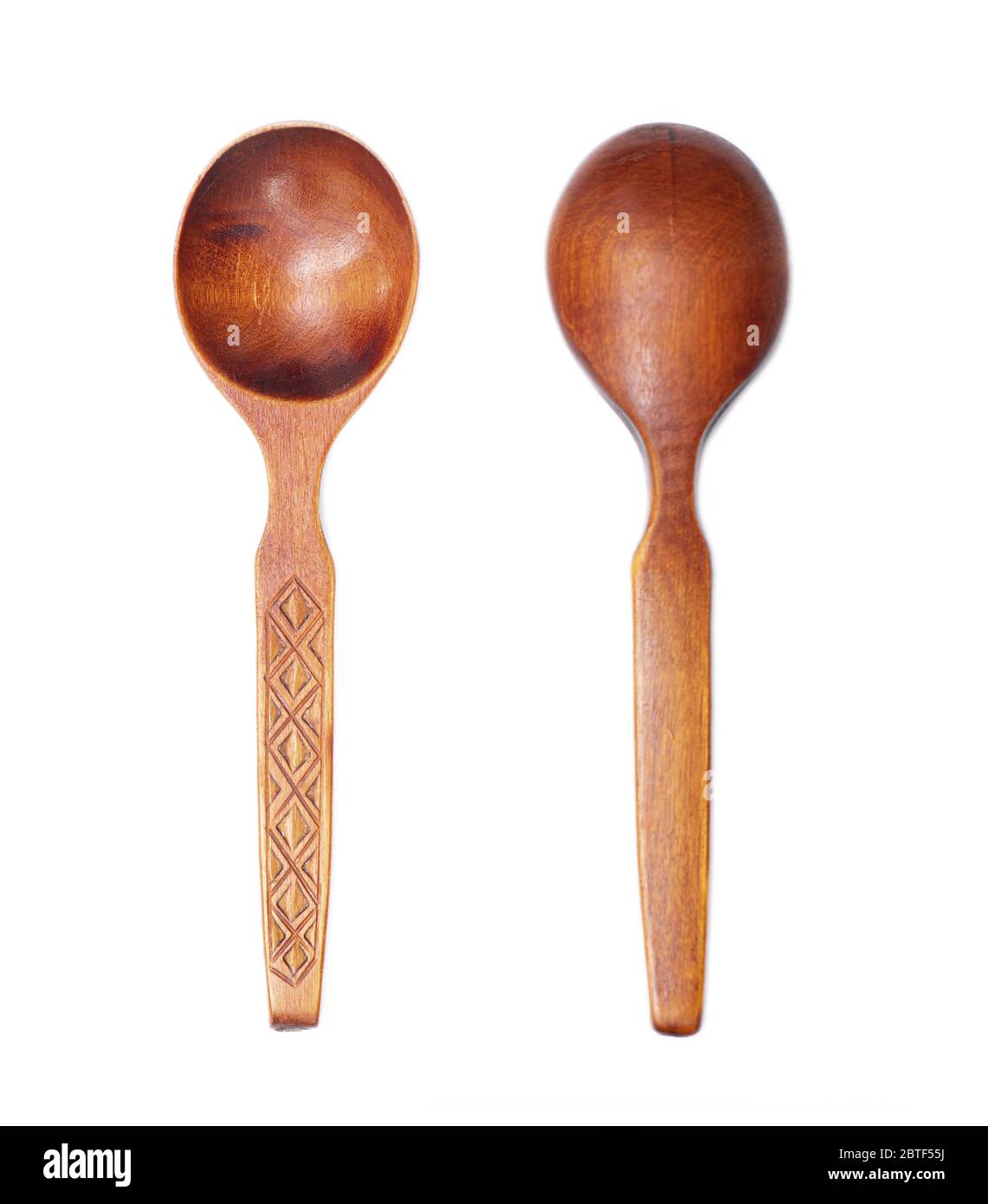 Front side and back side of a wooden spoon isolated on white background ...