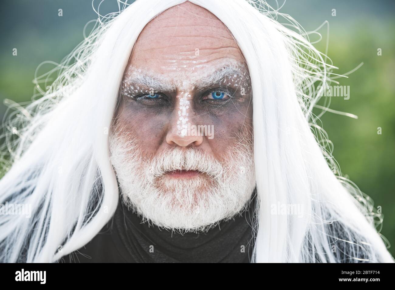 Devil man with angry face with Halloween make up. Devil vampire man ...