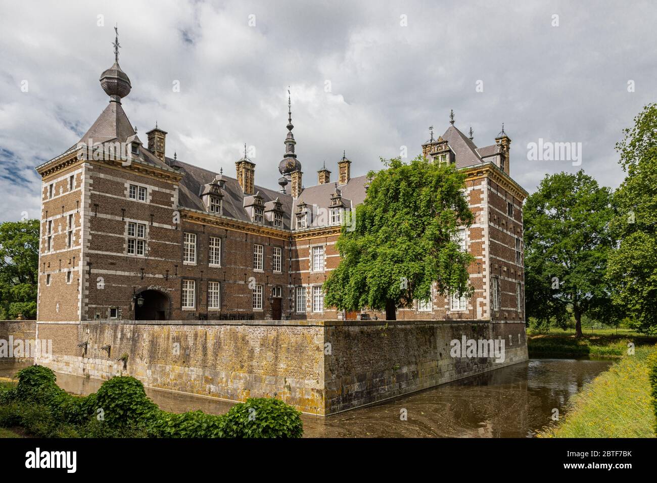 17th Century Eijsden Castle a moated manor house with a public park ...