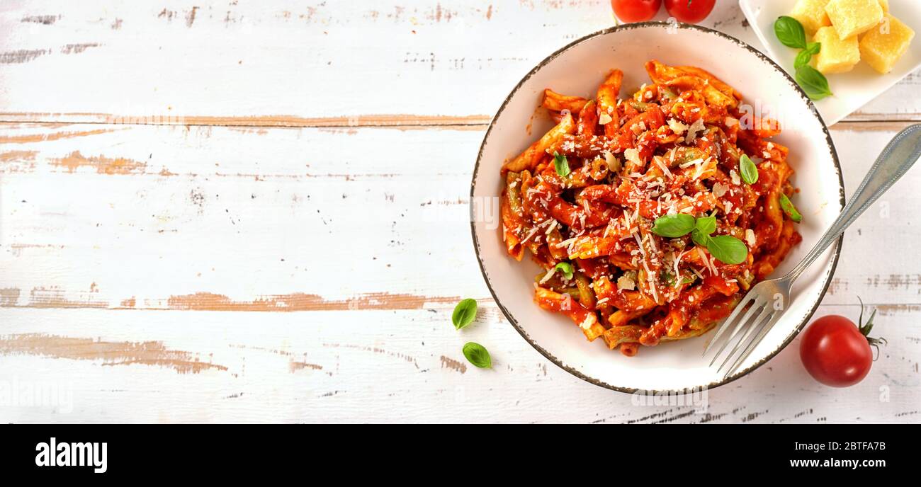 Top view of pasta penne with tomato sause and cheese parmesan Stock ...