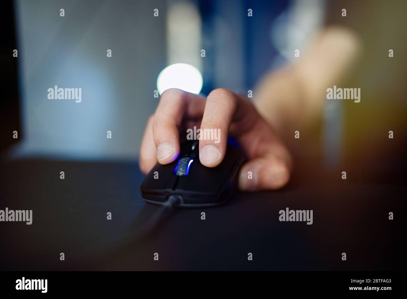 Close up of hands gamer playing in the video game using keyboard and ...