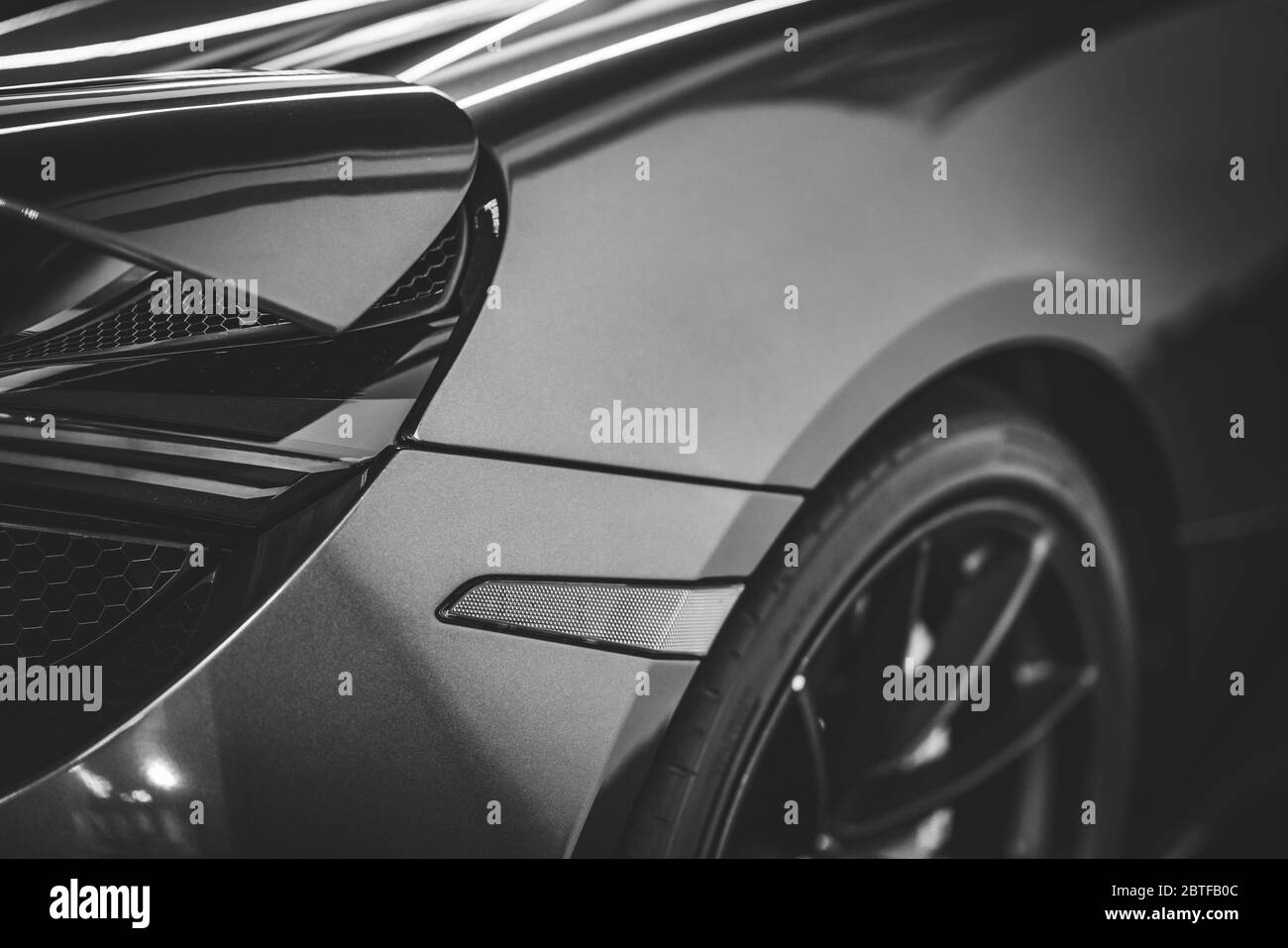 Detail of the back side of a sports car in black and white Stock Photo ...