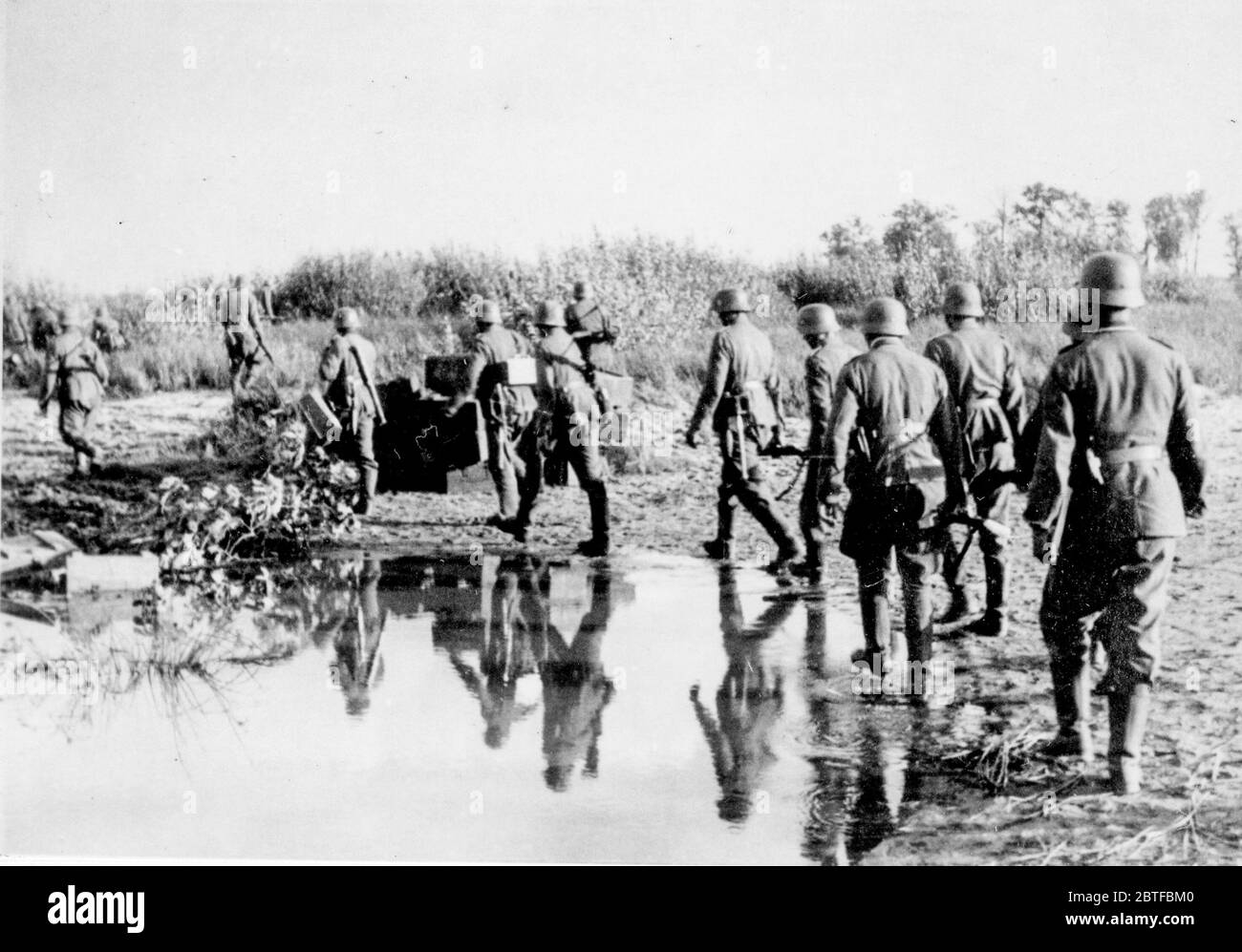german soldiers advancing towards the Desna River Bridge Operation ...