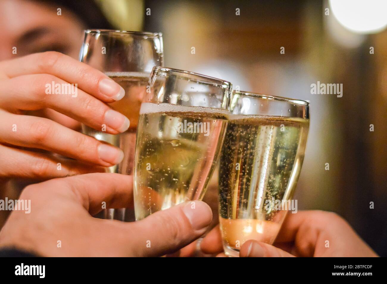 Woman hands toasting celebrate hi-res stock photography and images - Alamy