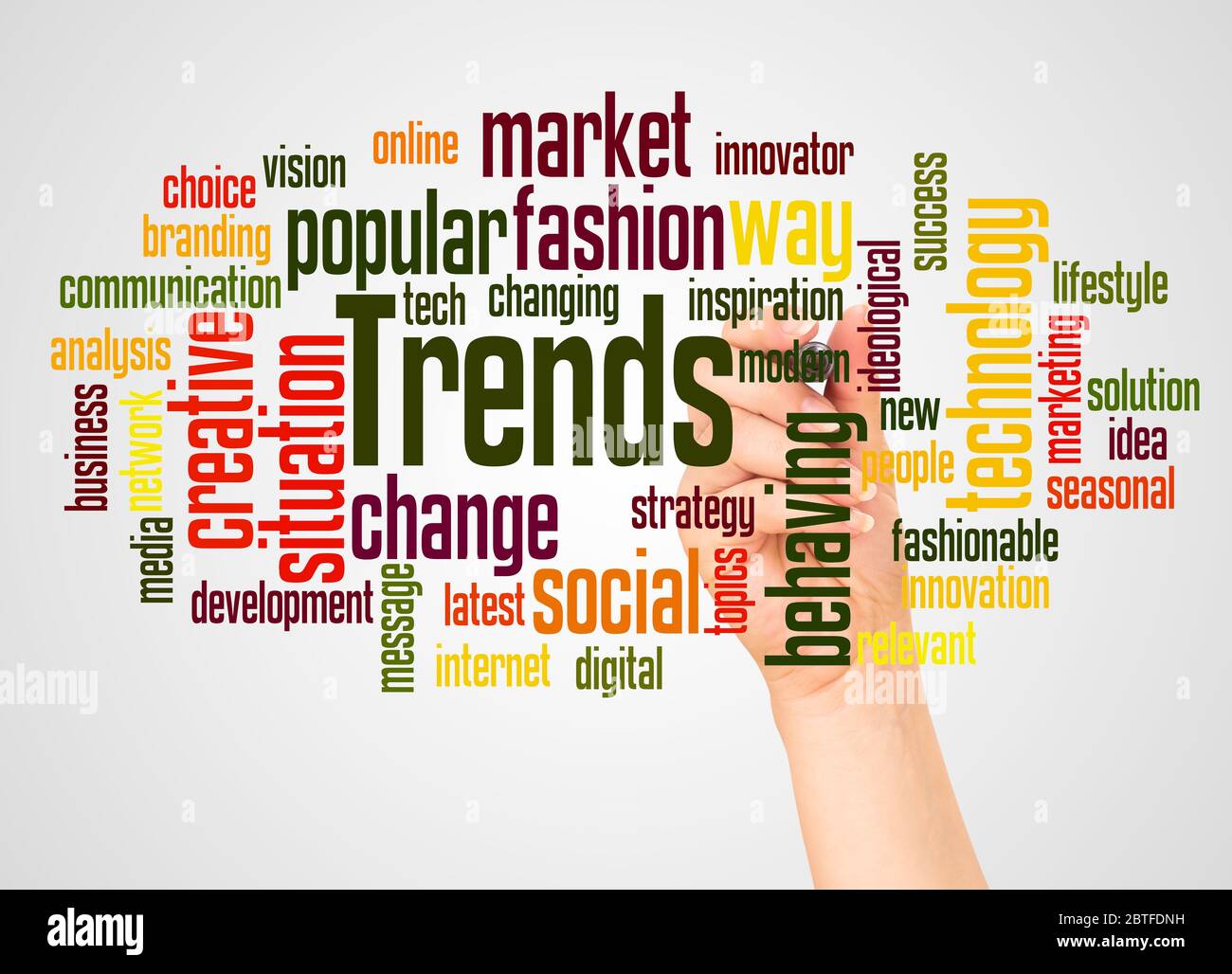 Trends word cloud and hand with marker concept on white background ...