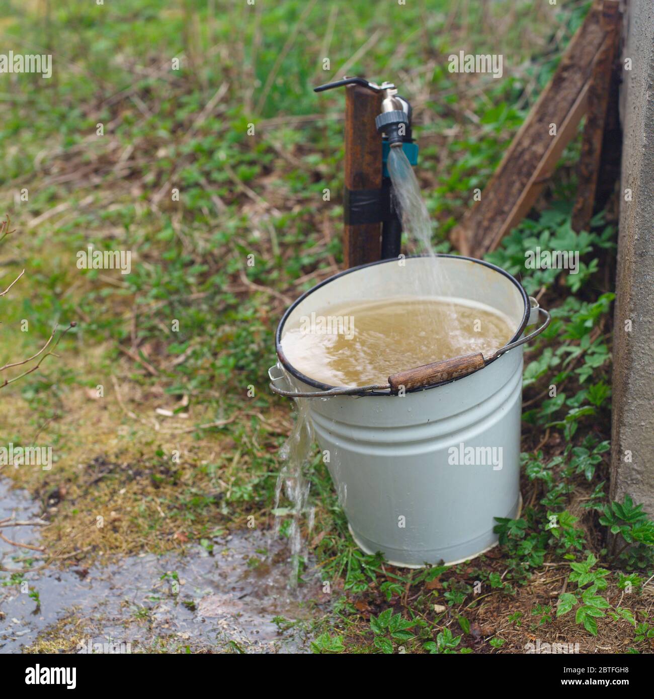 Leaking water from bucket hi-res stock photography and images - Alamy
