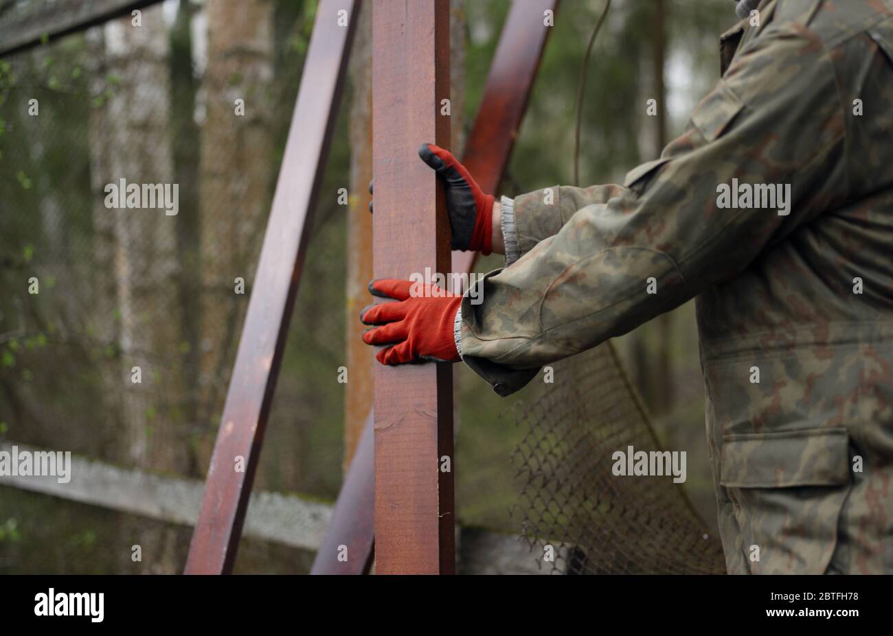 Repairing fence post hi-res stock photography and images - Alamy