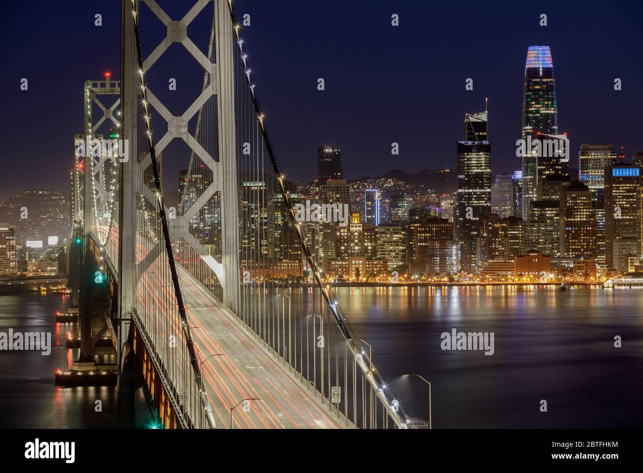 San Francisco Bay Bridge and Waterfront at Night Stock Photo - Alamy