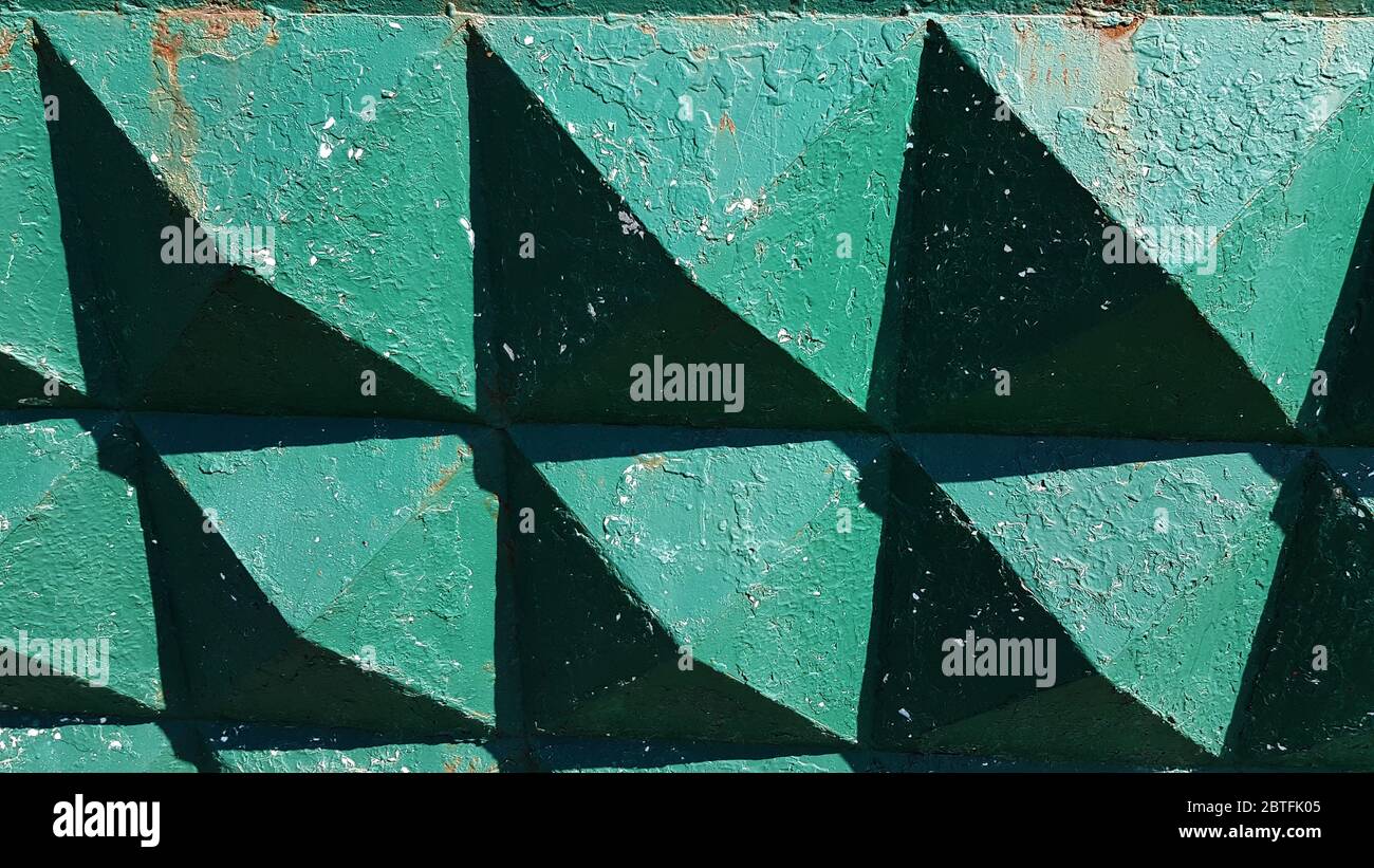 Closeup of rusty metal texture of geometric pyramid three-dimensional ...