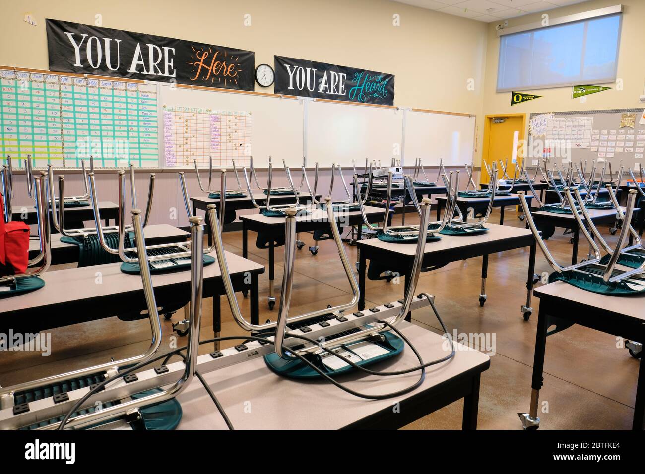 Empty classroom in an American high school; closed for distance ...