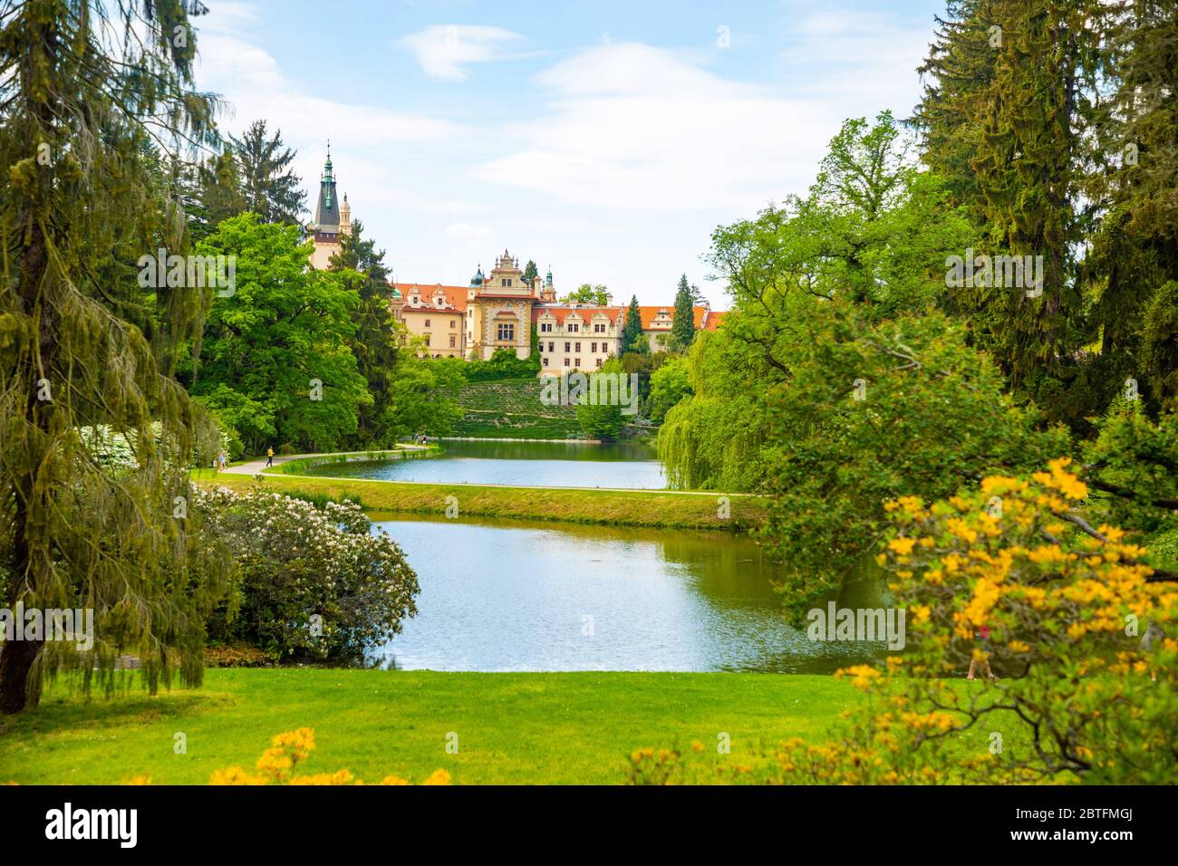 Castle with reflection in pond in spring time in Pruhonice, Czech ...