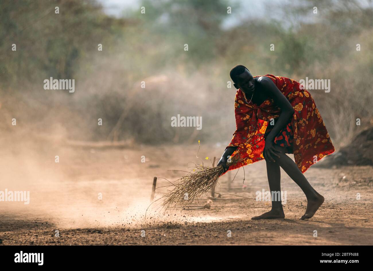 MUNDARI TRIBE, SOUTH SUDAN - MARCH 11, 2020: Man in bright garment ...