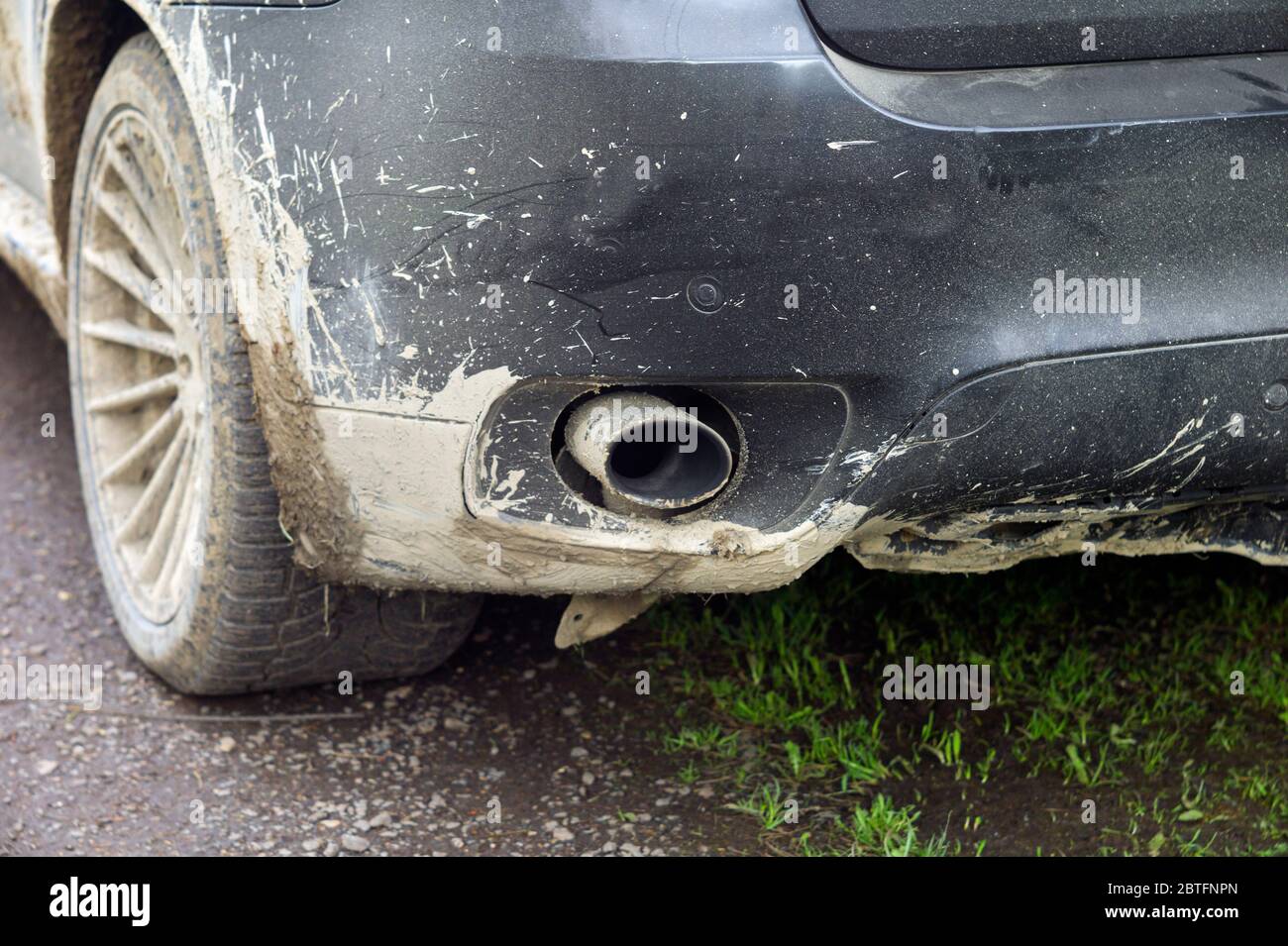 Exhaust pipe of a dirty vehicle, outdoor cropped shot Stock Photo - Alamy