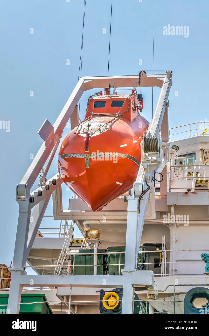 Red Lifeboat hanging on vessel.Stock Image Stock Photo - Alamy