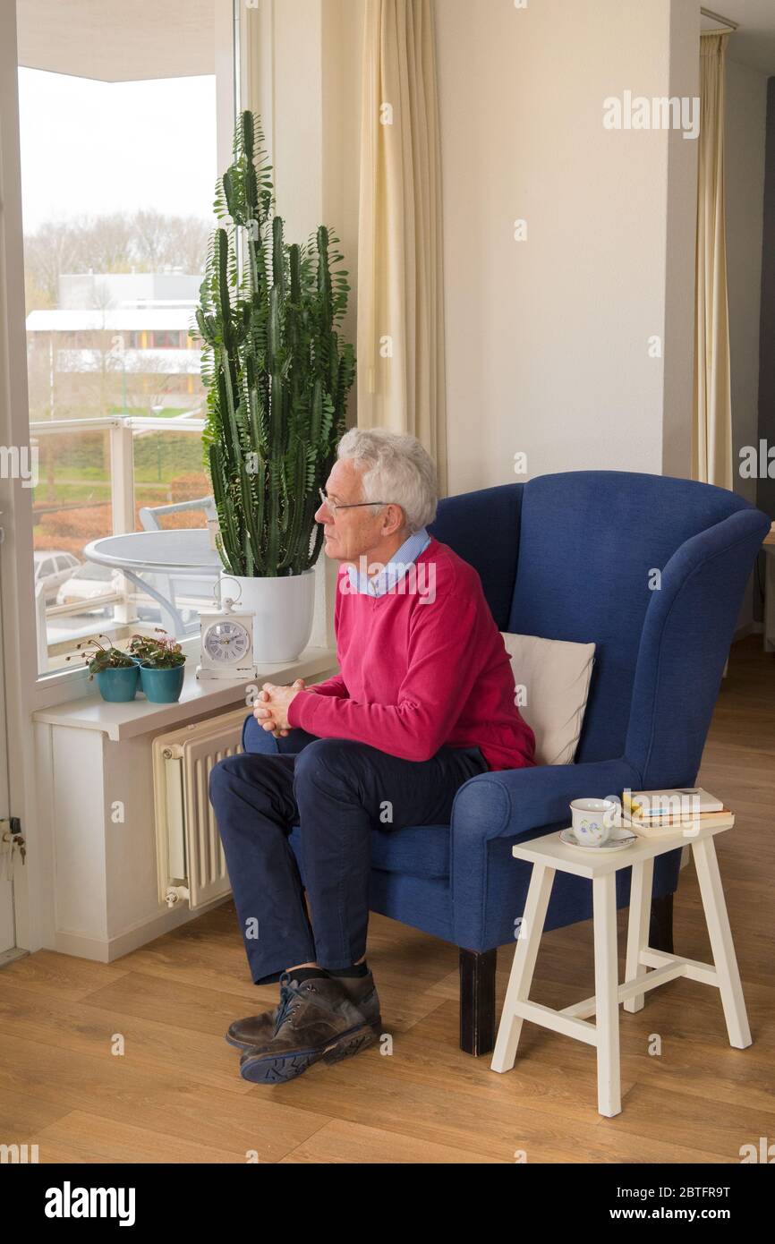 Senior man waiting chair hi-res stock photography and images - Alamy