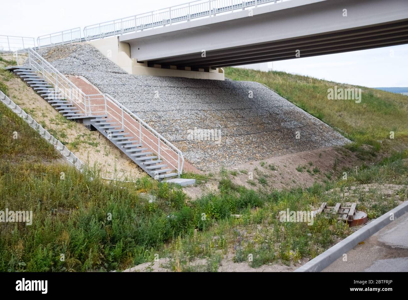 Reinforced concrete construction road junction. a Road construction and ...