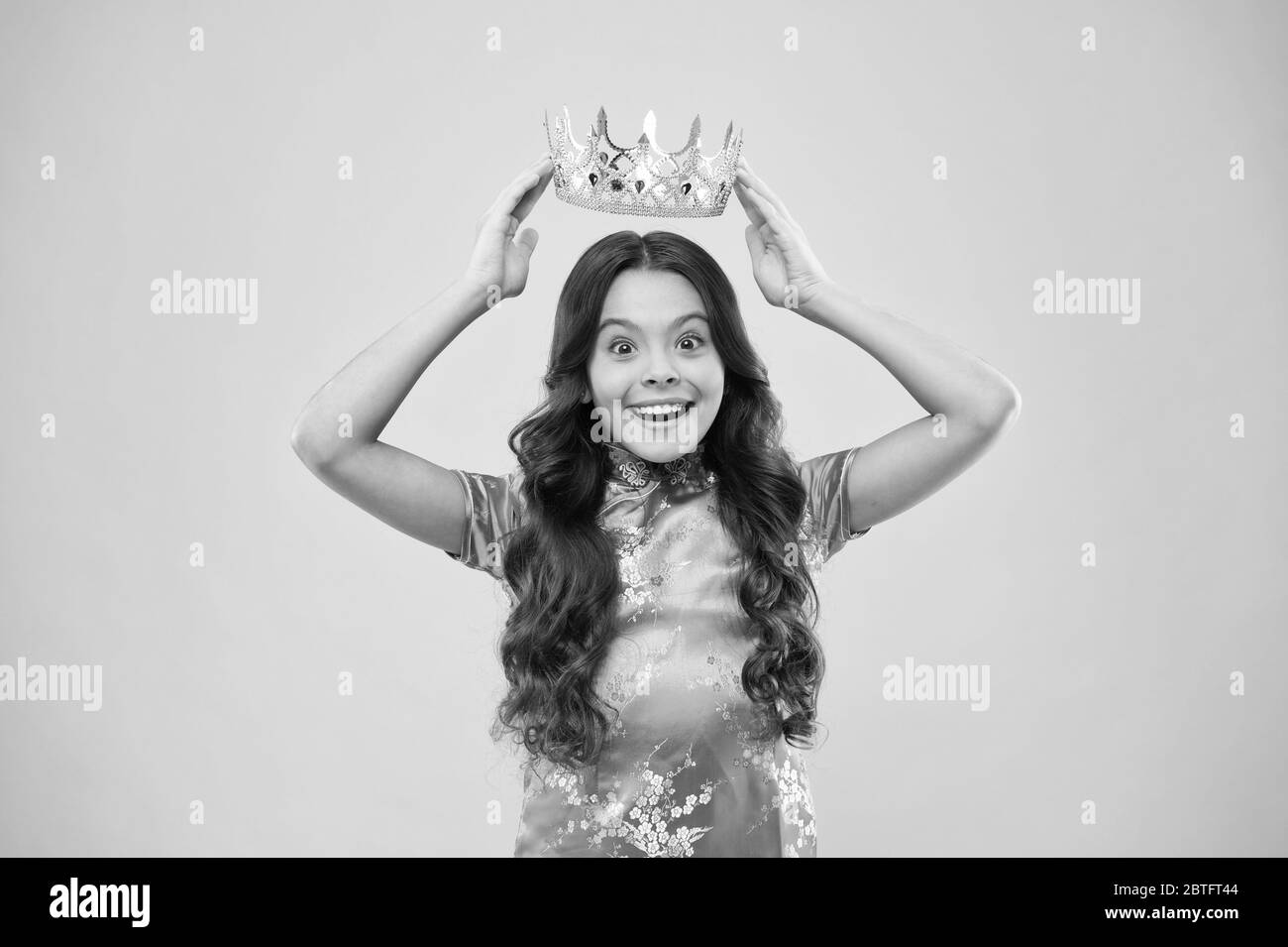 International beauty contest. Kid wear golden crown symbol of princess ...