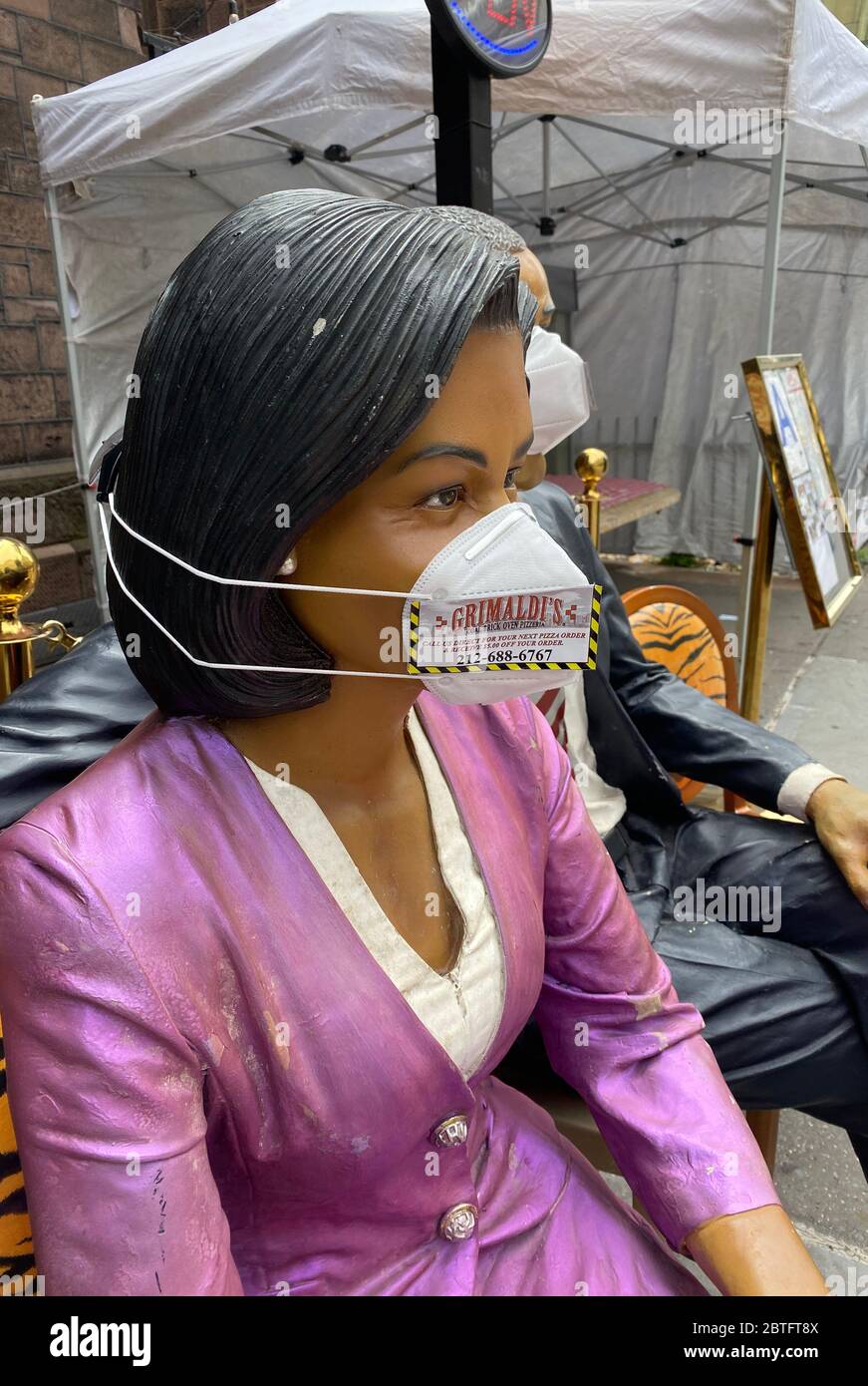 New York, NY, USA. 25th May, 2020. Masked ceramic statues of Barack and ...