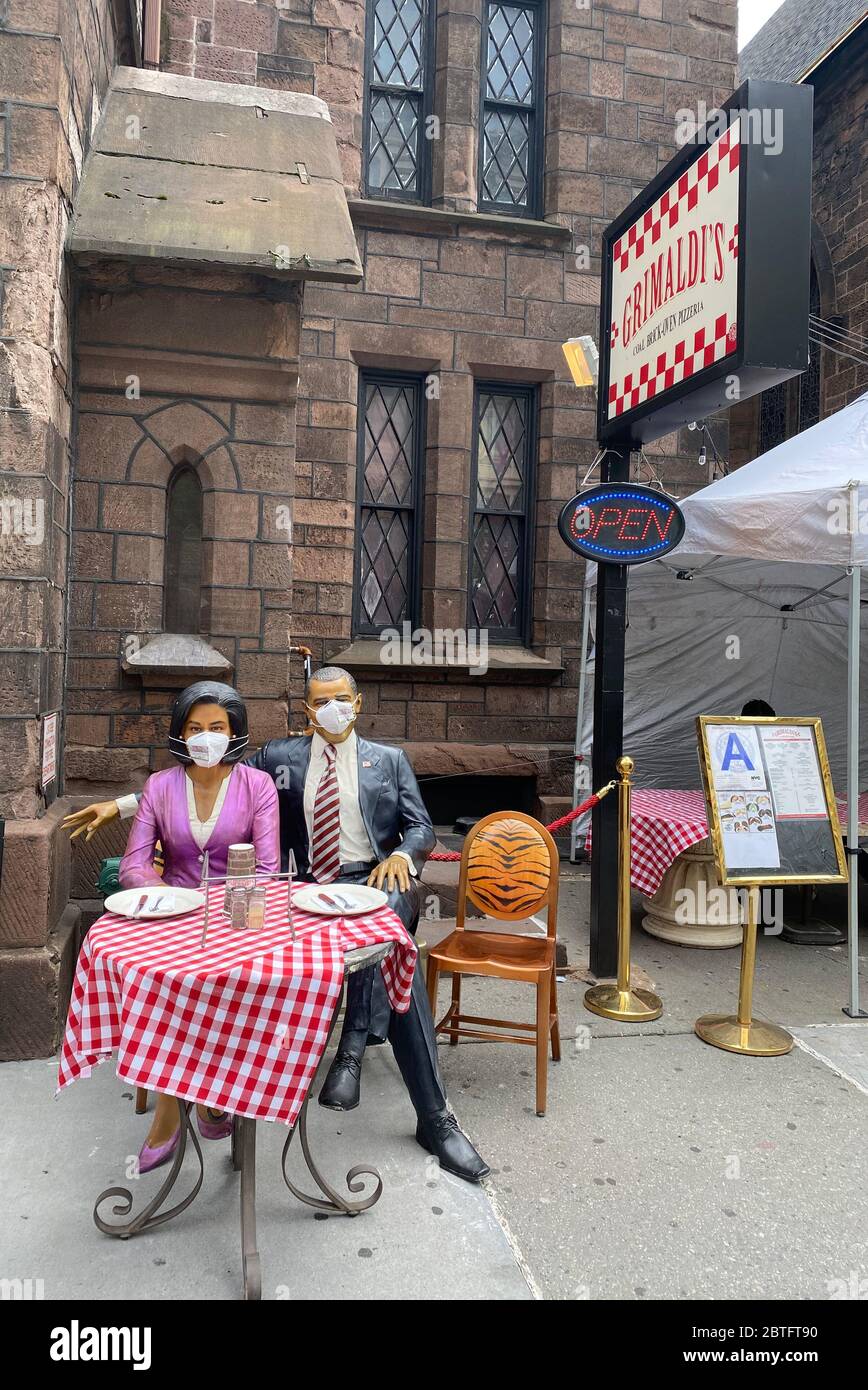 New York, NY, USA. 25th May, 2020. Masked ceramic statues of Barack and ...