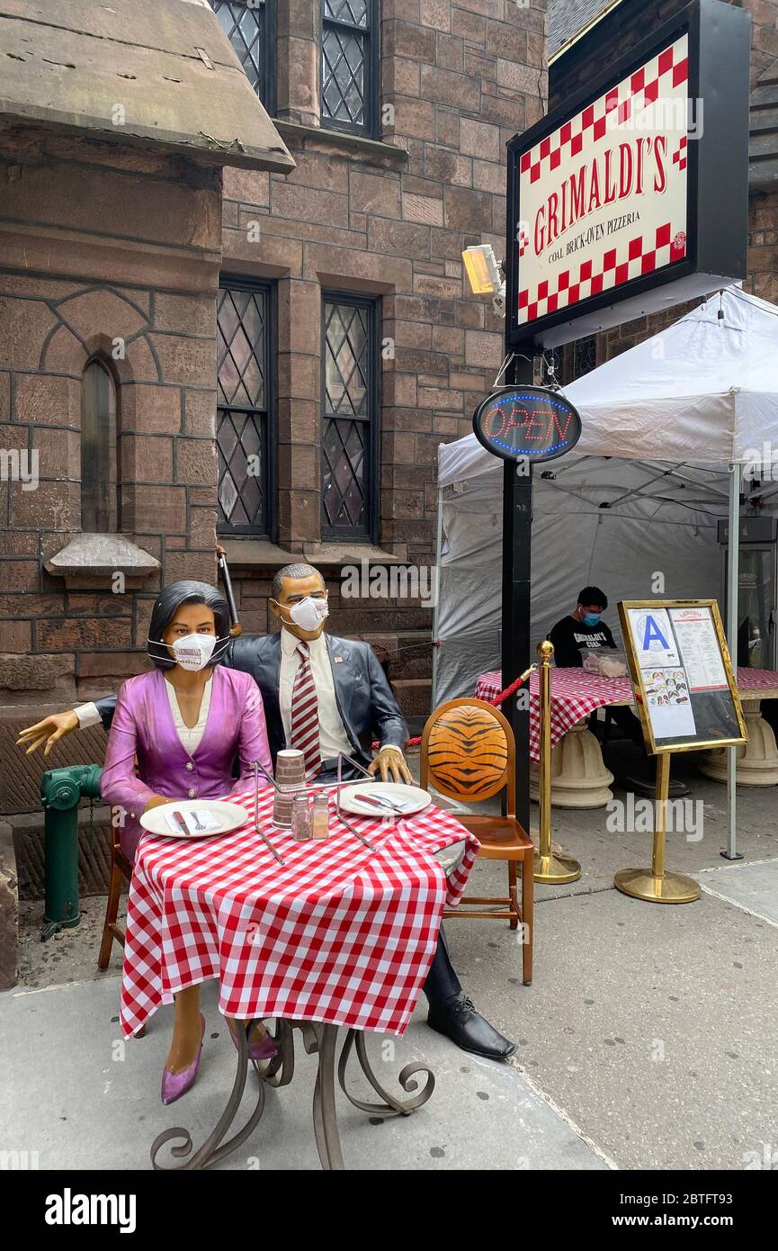 New York, NY, USA. 25th May, 2020. Masked ceramic statues of Barack and ...
