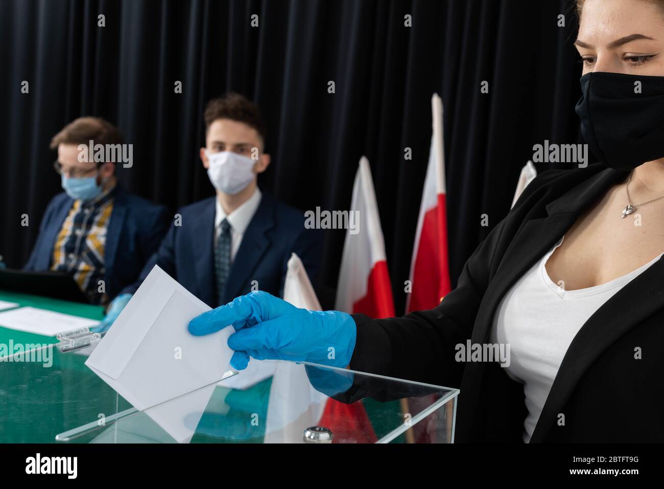 Ballot box. An envelope with a ballot paper. He tosses the completed ...