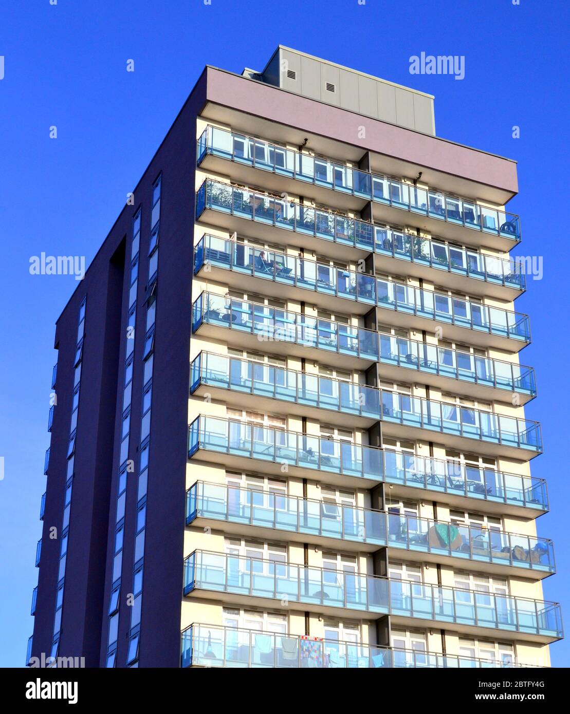 A tower block of flats, named Artillery Court, in Ardwick district ...