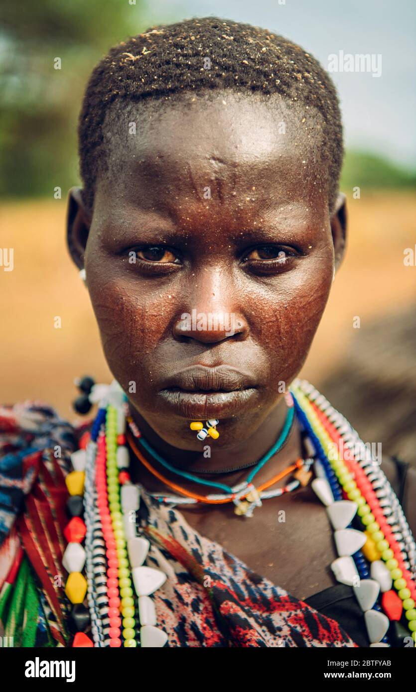 African woman piercing hi-res stock photography and images - Alamy