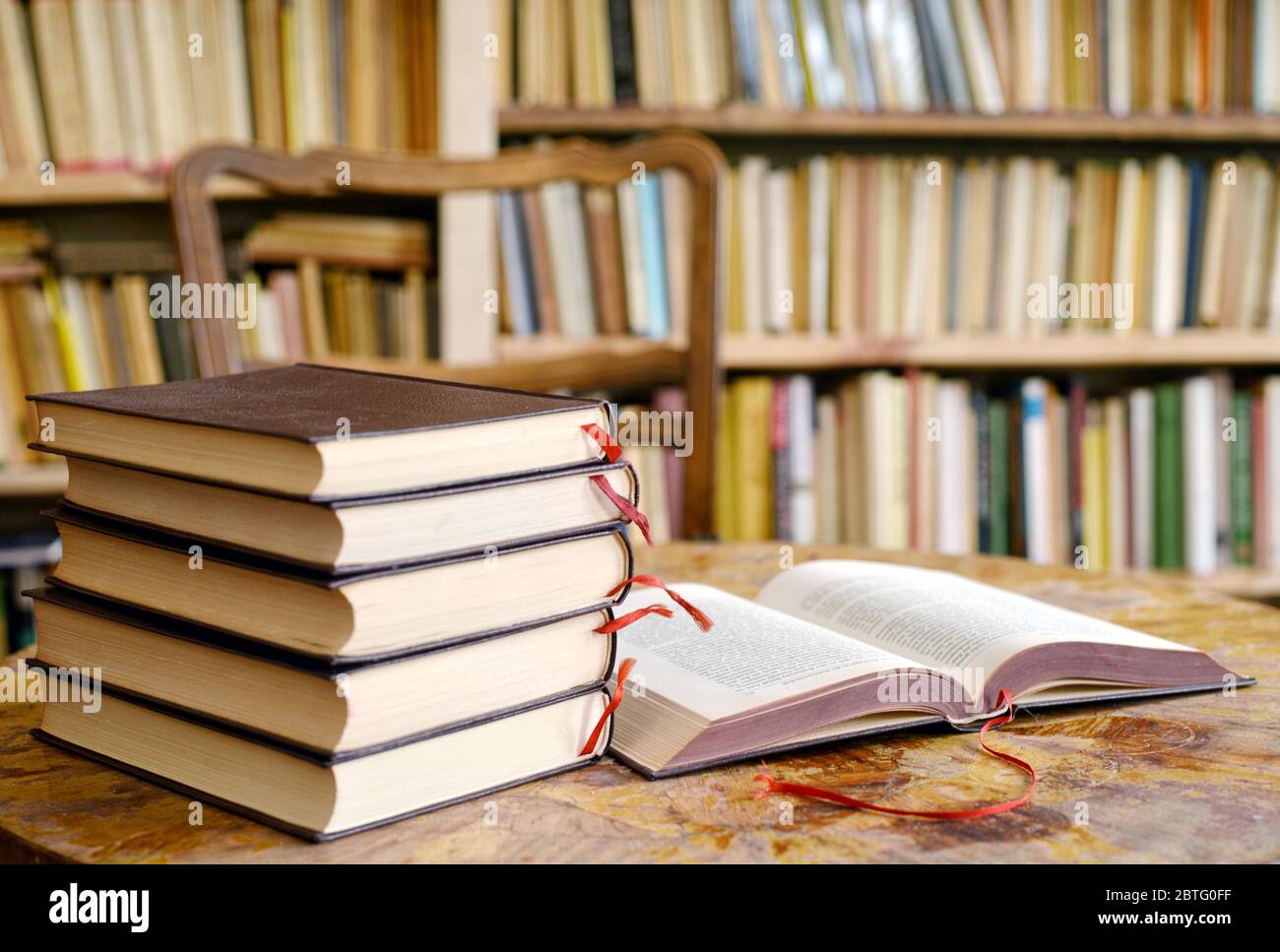 aged books on a table Stock Photo - Alamy