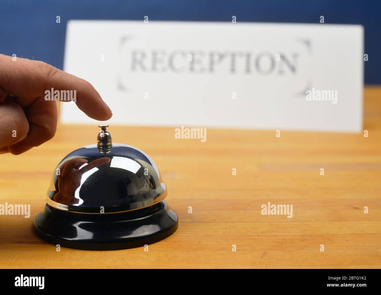 Guest rings the Hotel Bell Stock Photo - Alamy