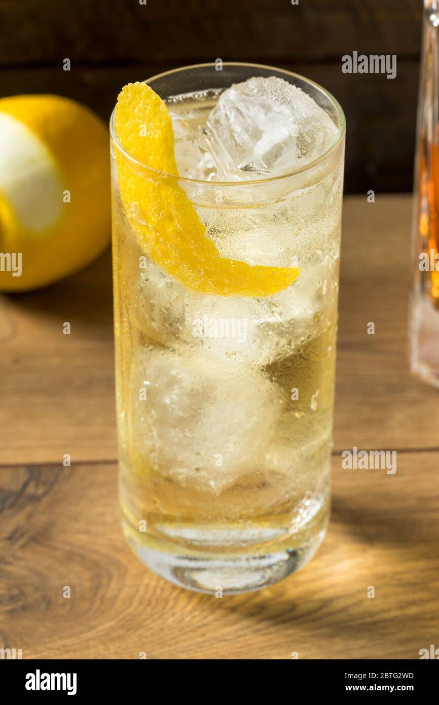 Alcoholic Whiskey and Soda Highball with Lemon Stock Photo - Alamy