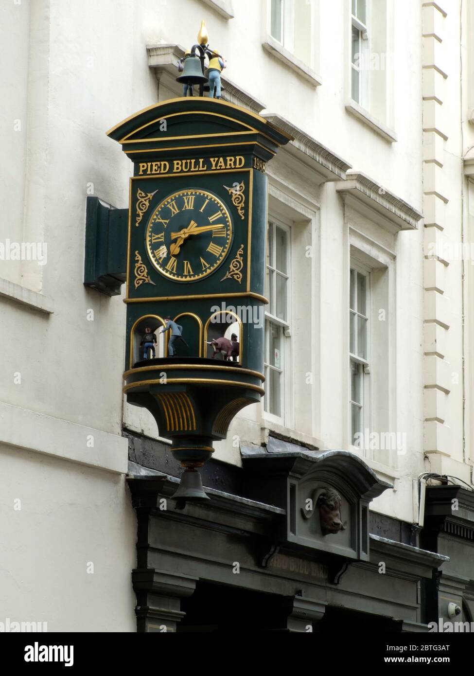 Clock, Pied Bull Yard, Bloomsbury, London, England Stock Photo - Alamy
