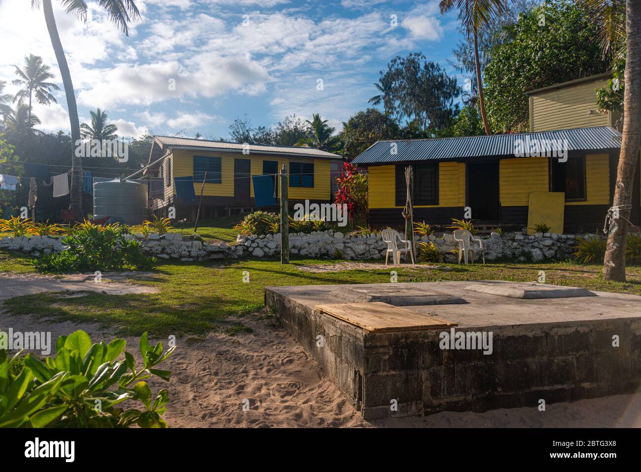 Yellow bungalows of the sunrise lagoon homestay on Nanuya lailai. Fiji ...
