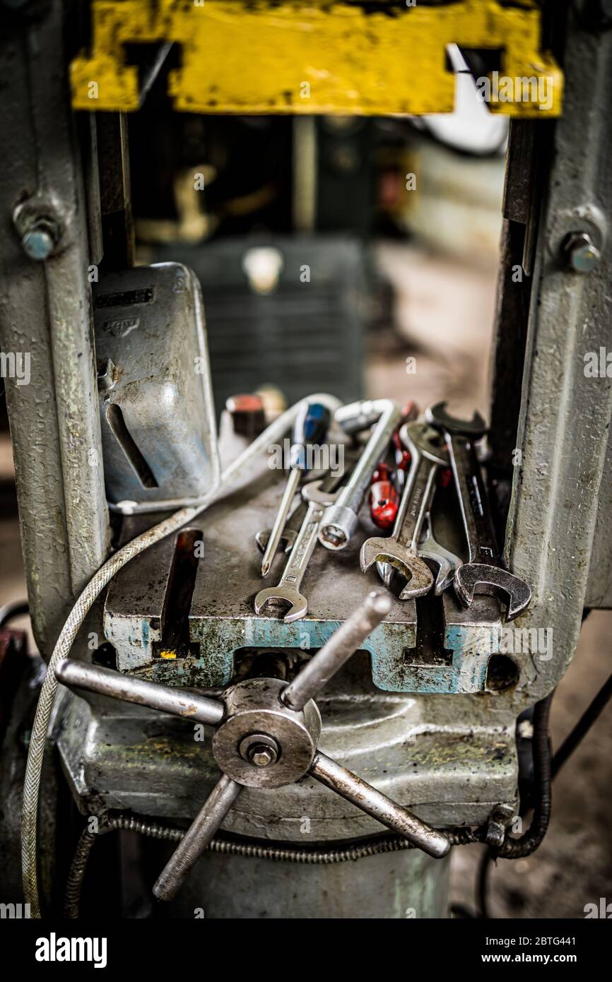 dirty tools in ironworks factory on the machine Stock Photo - Alamy