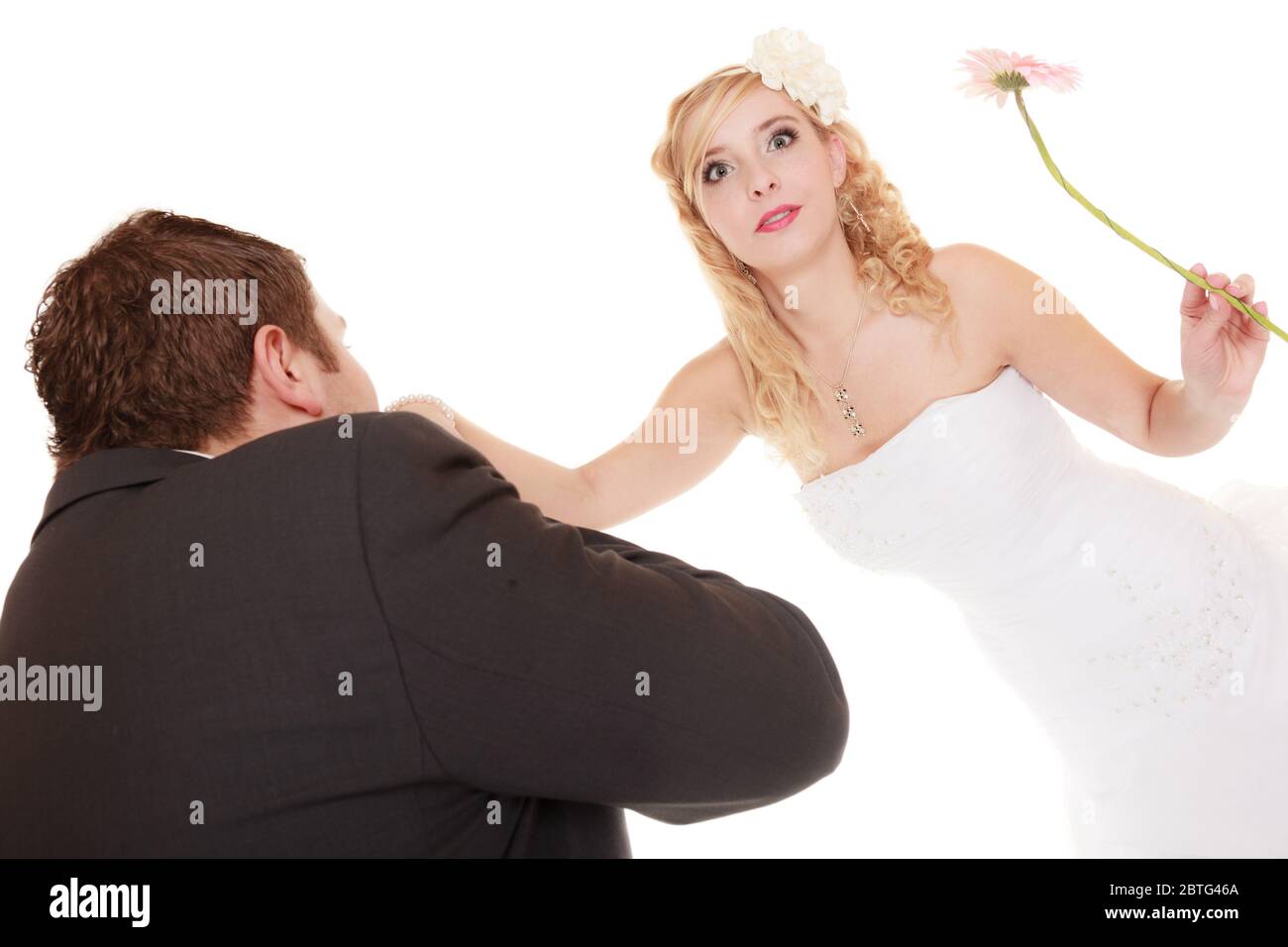 Wedding day. Male groom kissing hand of female bride isolated on white ...