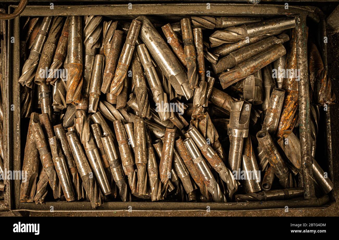 box of rusted iron drills Stock Photo - Alamy