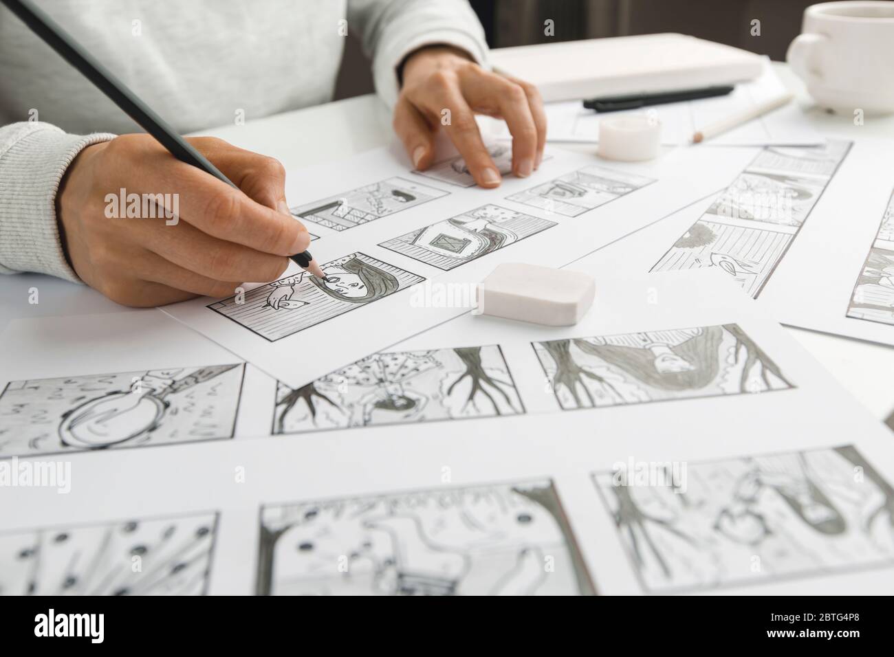 Hands of the artist draw a storyboard on paper. Storytelling. Story ...